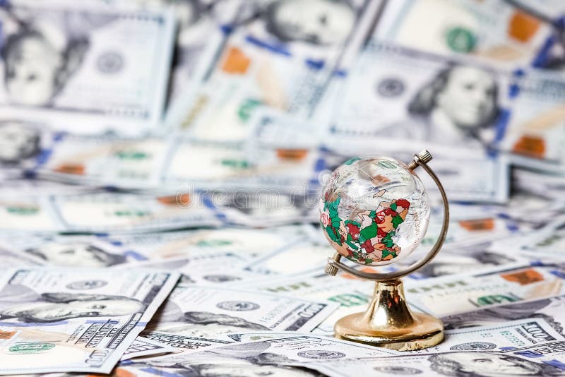 Globe on money dollars stock photo. Image of bank, commerce - 238741206