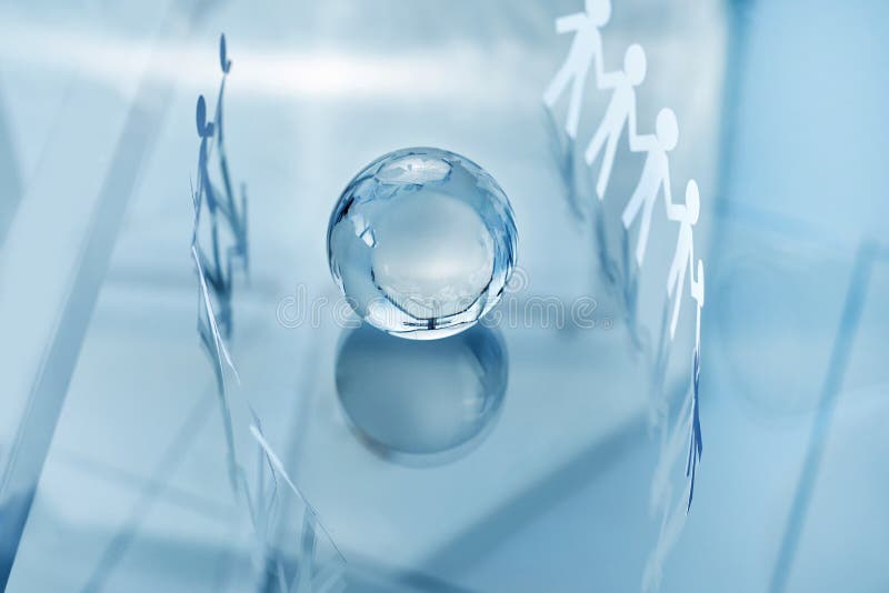 Glass Globe and a Paper Business Team on an Office Background . Stock ...