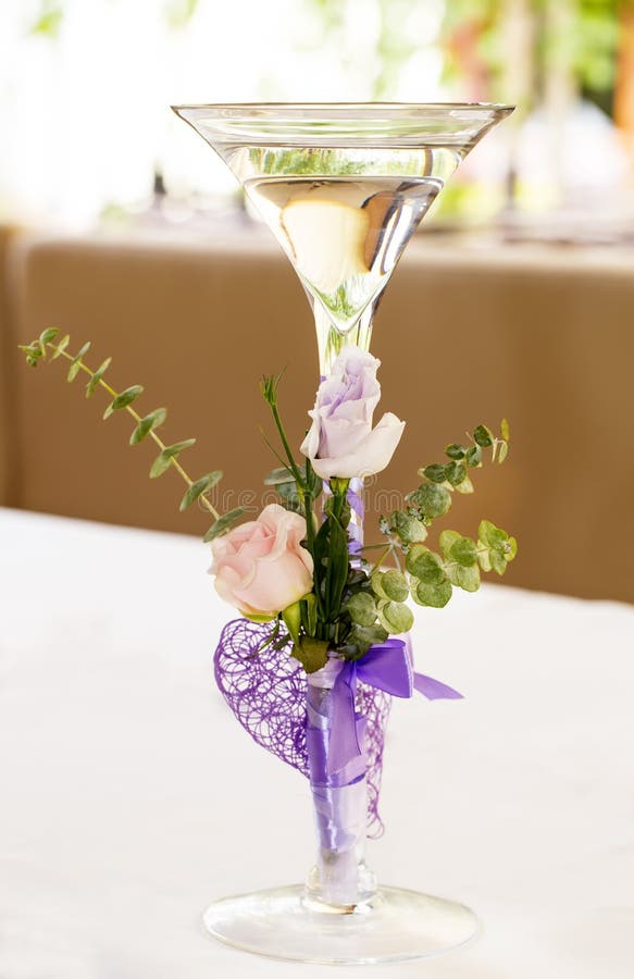 Glass goblet and flowers stock photo. Image of dinner - 48601956