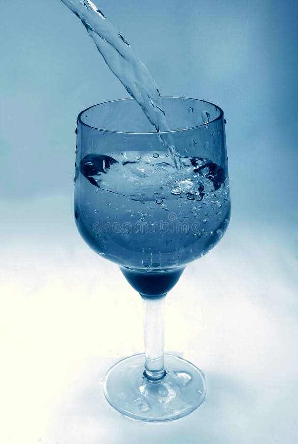 Glass Goblet In Which The Water Flowing Stock Photo - Image of cold ...