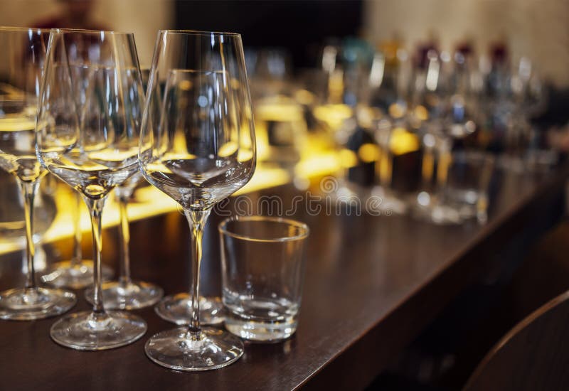 Glass Goblets Placed in Rows on Table during Wine Tasting Procedure in ...
