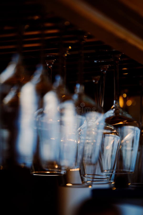 Glass Goblets Suspended Above a Bar Counter. Summer Evening Stock Image ...