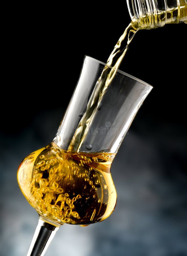 Glass of grappa stock photo. Image of bright, primer - 38857654