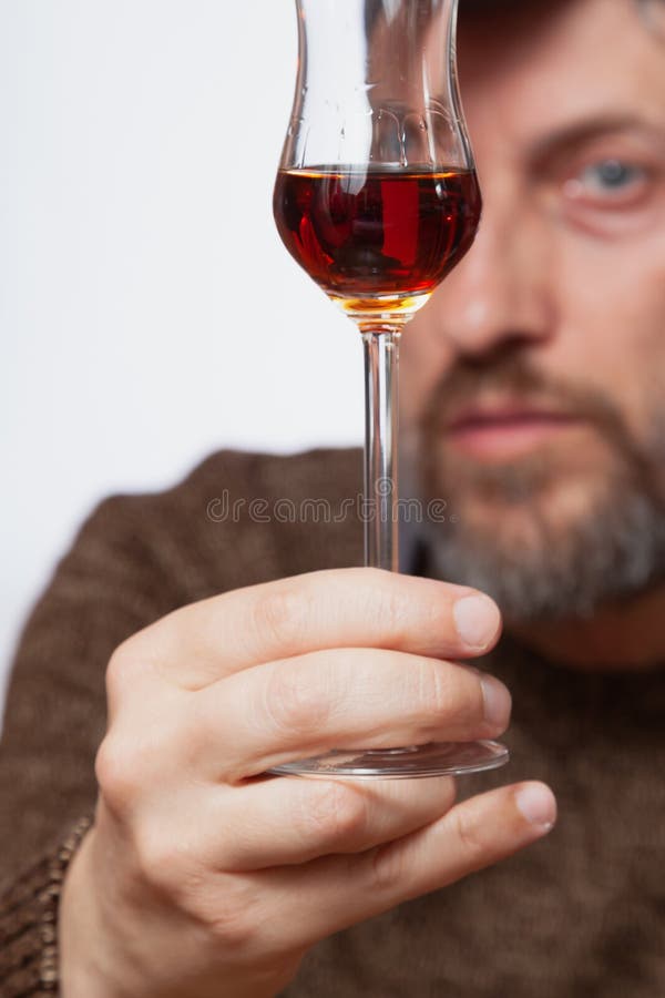 Glass with Grappa in Man Hand Close Up Stock Image - Image of noble ...