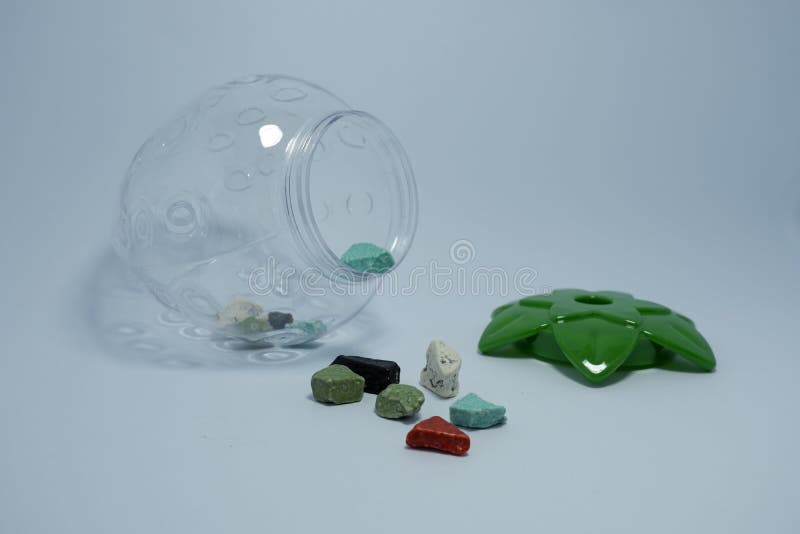 Glass and Green Object in White Background Stock Photo - Image of ...