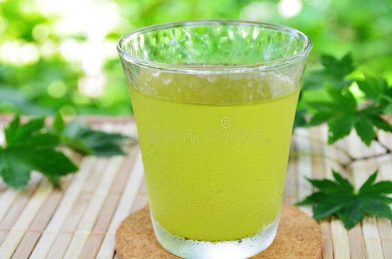 A glass of green tea stock image. Image of japanese, green - 32682425