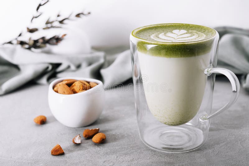 Glass of Green Tea Matcha Latte with Almonds Stock Image - Image of ...