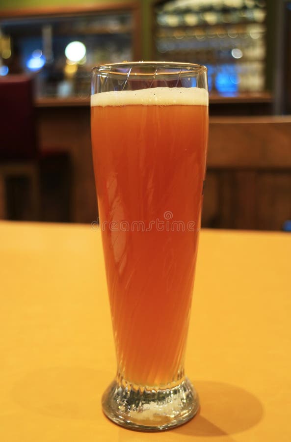 Glass of Hefeweizen, a German Wheat Beer on the Table Stock Photo ...
