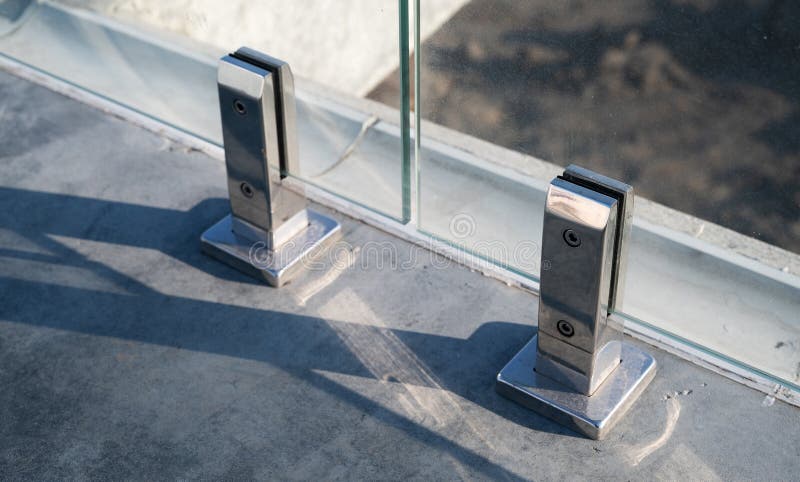 Glass Holder for Glass Panels Stock Photo - Image of outdoor, balcony ...