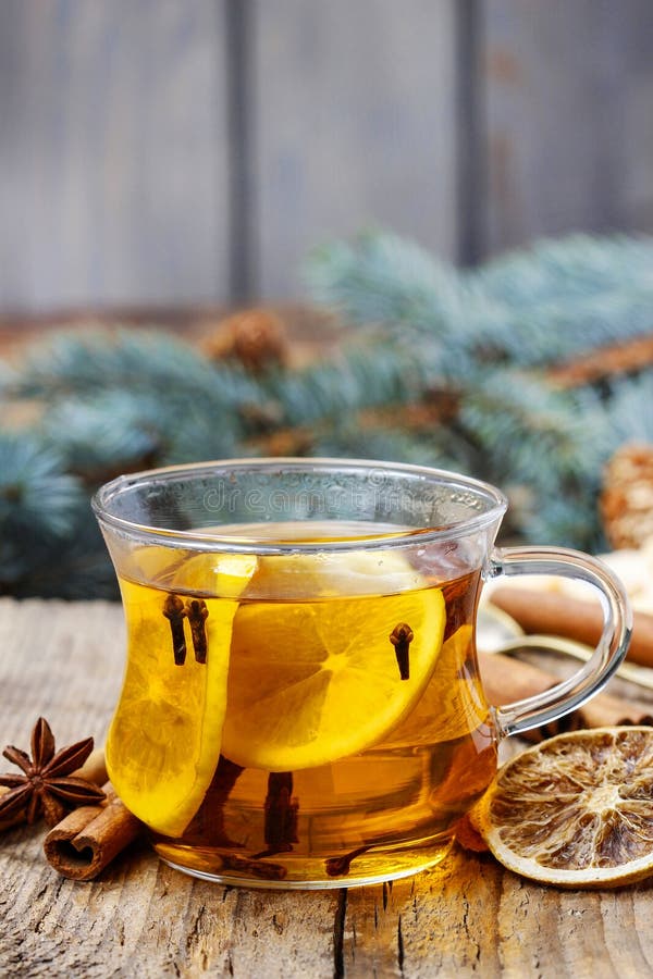Glass of Hot Steaming Tea among Christmas Decorations Stock Image ...
