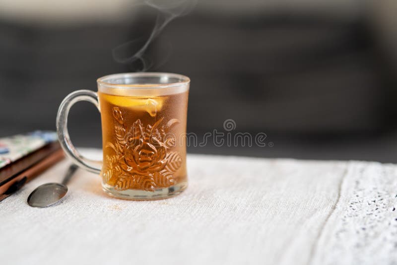 Glass of hot tea stock image. Image of rustic, cozy - 179853477