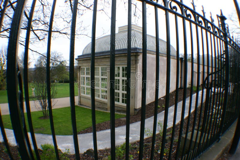 Glass house behind bars stock image. Image of security - 136319