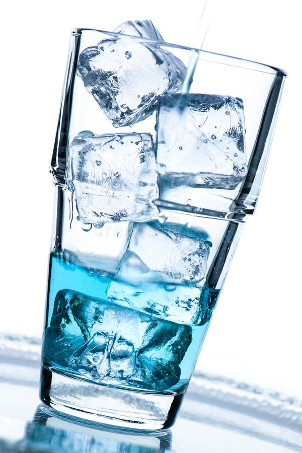 Glass with Ice Cubes and Blue Drink Stock Image - Image of backlight ...