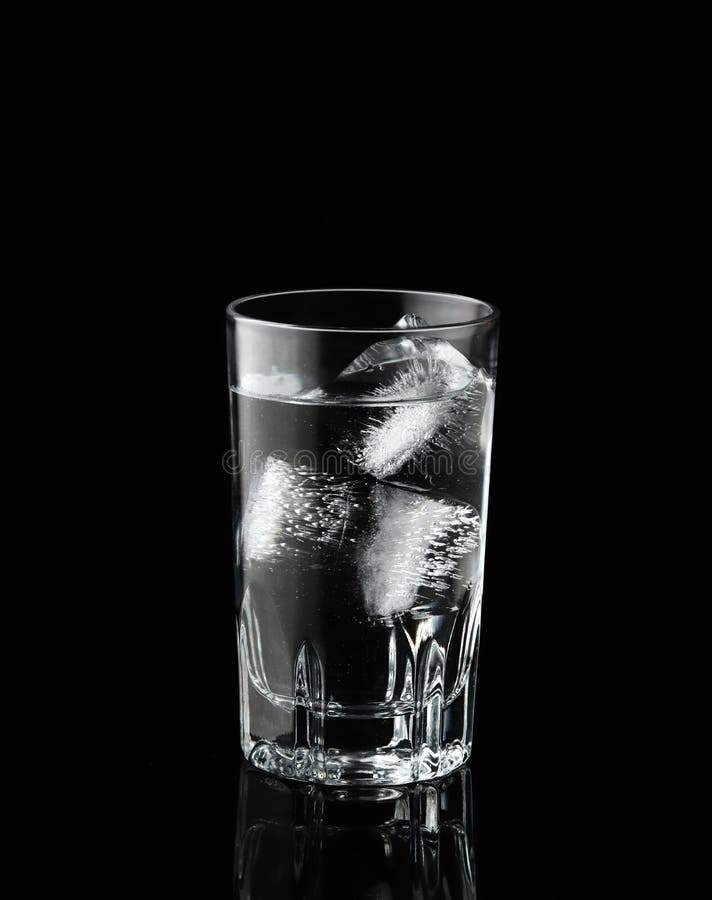 Glass with Ice and Water on Black Background Stock Photo - Image of ...