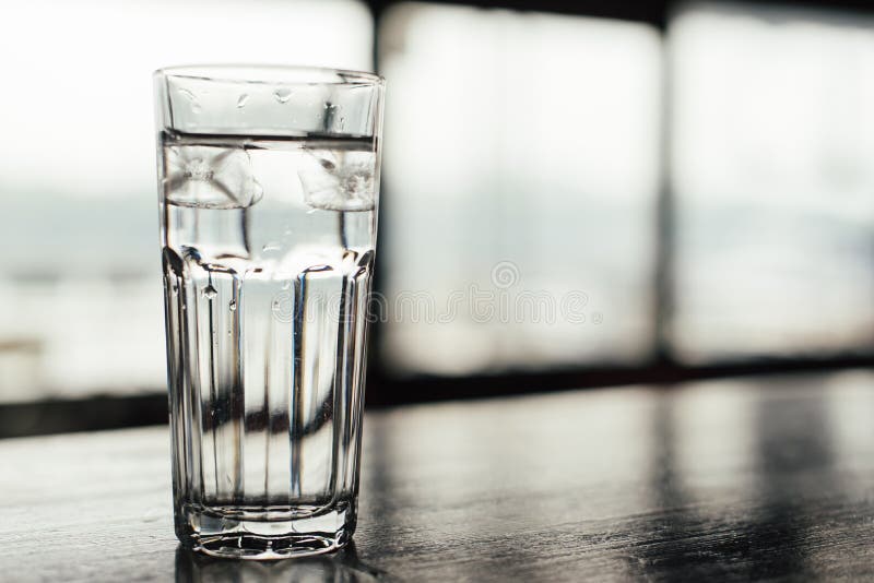 Glass of Ice Water on the Table Stock Photo - Image of iced, drink ...