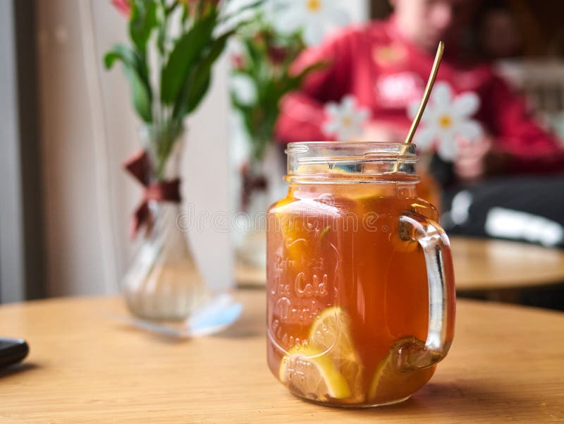 A Glass of Iced Tea with a Straw in it Stock Photo - Image of slice ...