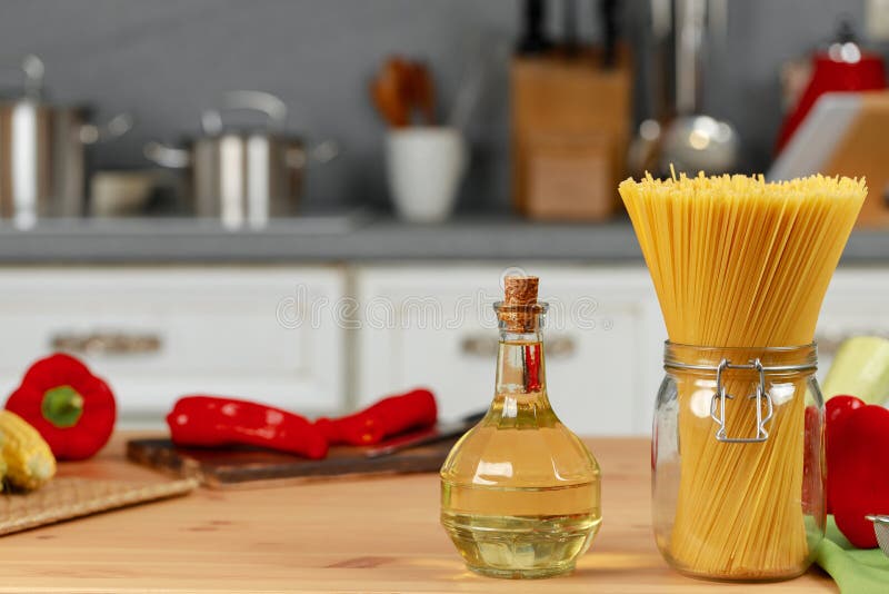 Glass Jar of Dry Pasta on Kitchen Counter Stock Image - Image of glass ...