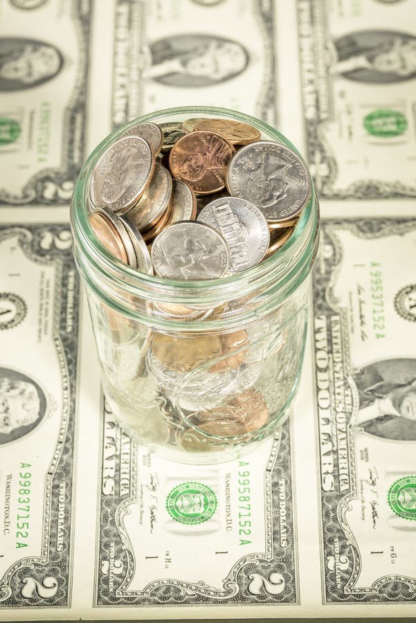 Jar Filled with Coins and Dollar Bills Stock Photo - Image of financial ...