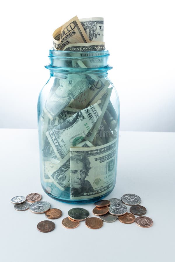 Glass Jar Full of Money Representing Saving for Something Stock Photo ...