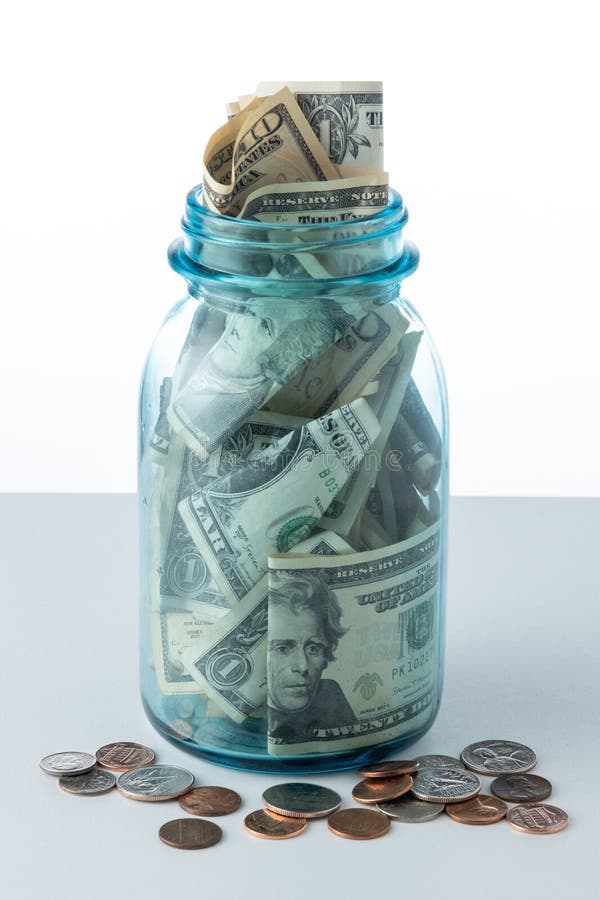 Glass Jar Full of Money Representing Saving for Something Stock Photo ...