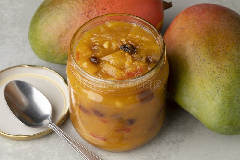 Glass Jar with Homemade Mango Chutney and Fresh Mango Stock Photo ...