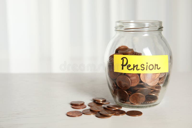 Glass Jar with Label PENSION and Coins on White Table Stock Photo ...