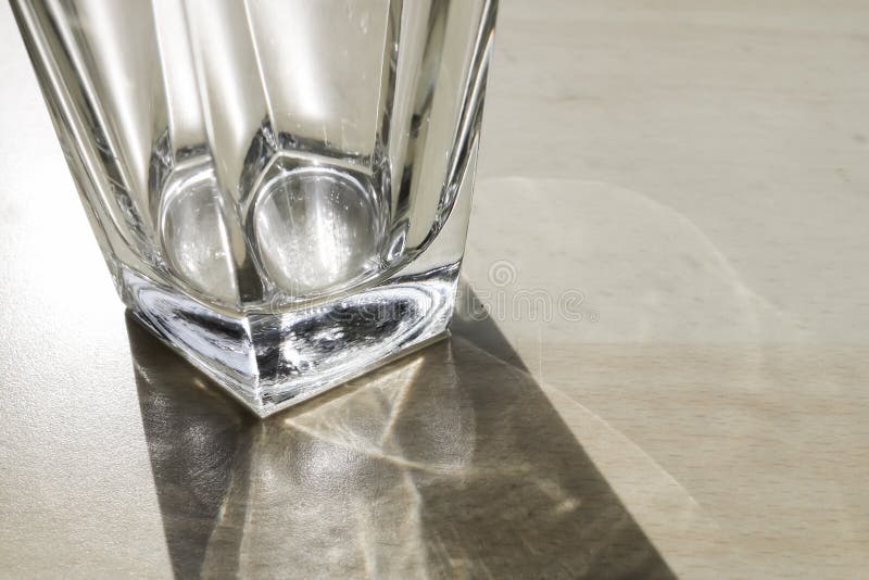 Glass Jar Leaving Reflections on the Ground Covered by the Sunlight ...