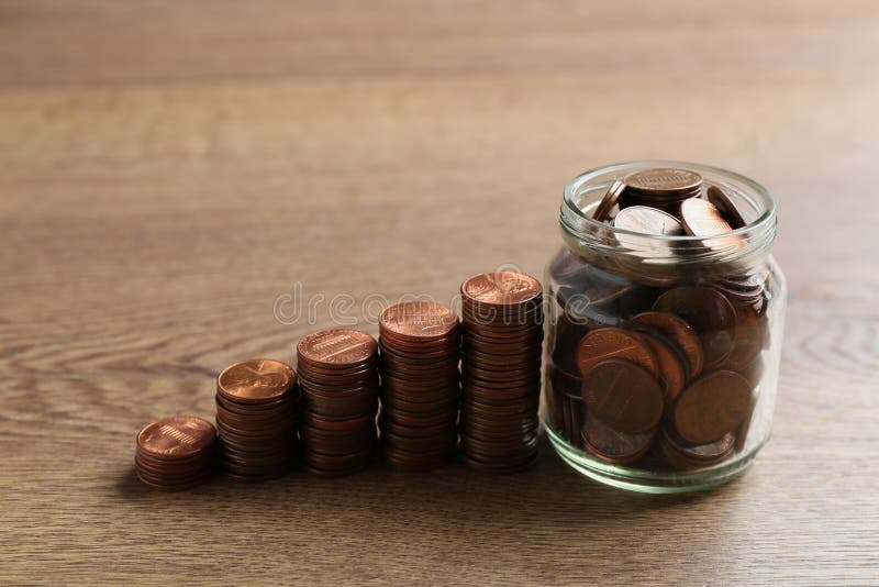 Glass Jar and Stacks of Coins. Money Saving Concept Stock Image - Image ...