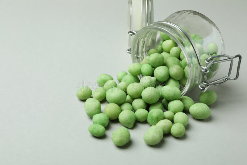 Glass Jar with Wasabi Nuts on Gray Background Stock Image - Image of ...