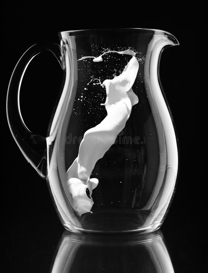 Glass jar and white liquid stock photo. Image of splashes - 22799470