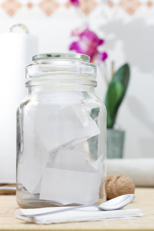 Glass jar with white paper stock image. Image of rolled - 40517613