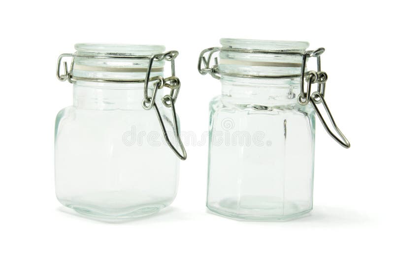 Glass jars stand on shelf stock image. Image of bottle - 237391635