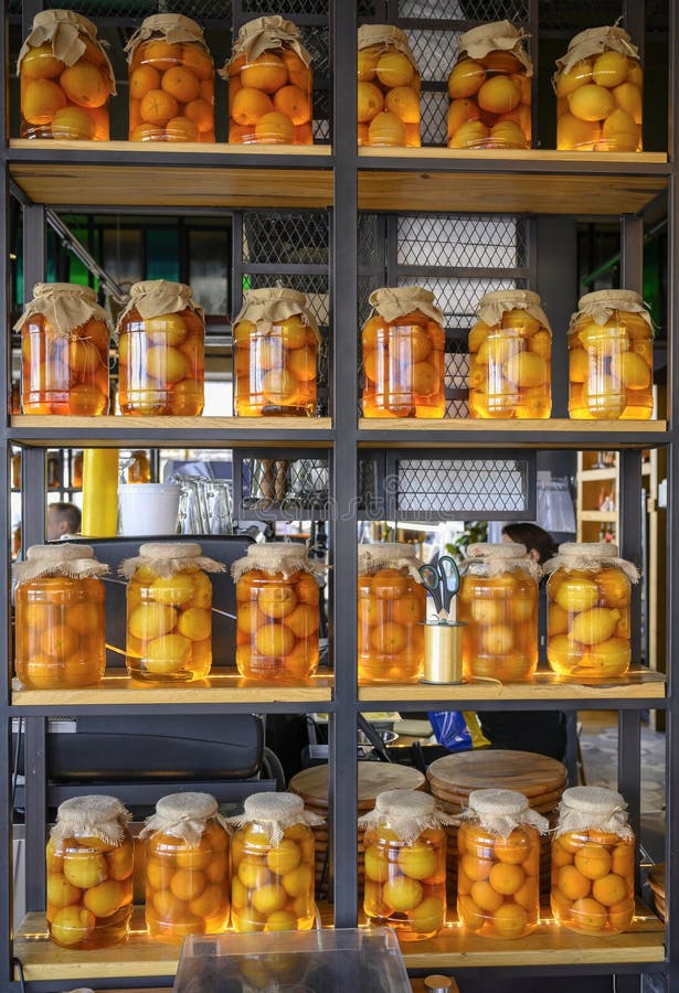 Glass Jars with Canned Lemons and Tangerines on the Shelf Stock Image ...