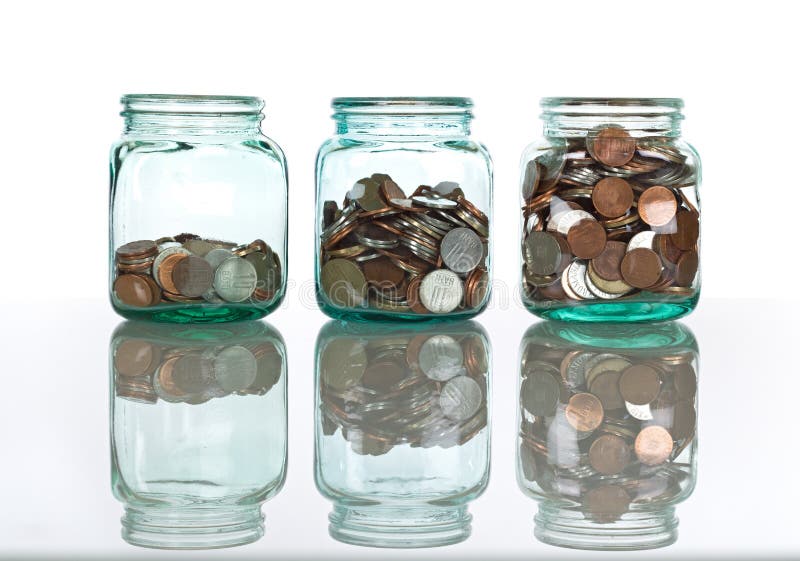 Saving money in old jars stock photo. Image of insurance - 8694158