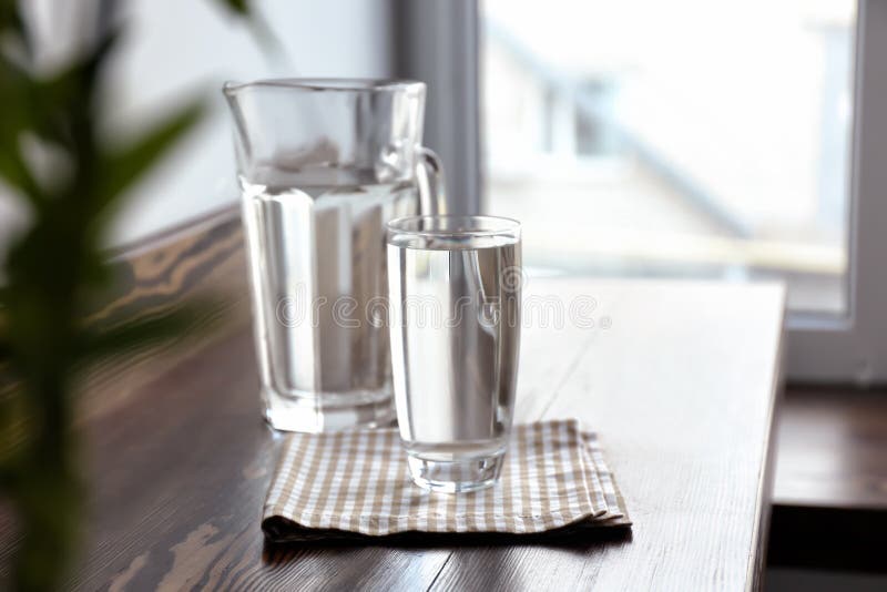 Glass and Jug of Cool Clean Water on Table Stock Image - Image of fresh ...