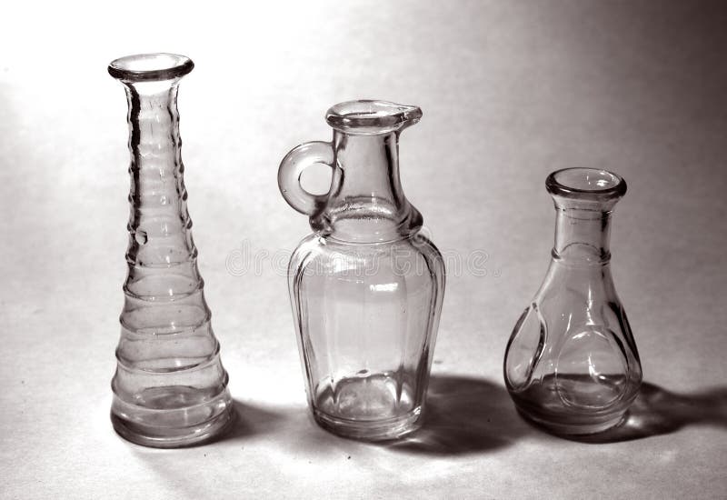 Glass Jugs in Different Shapes Stock Image - Image of shadows, shades ...