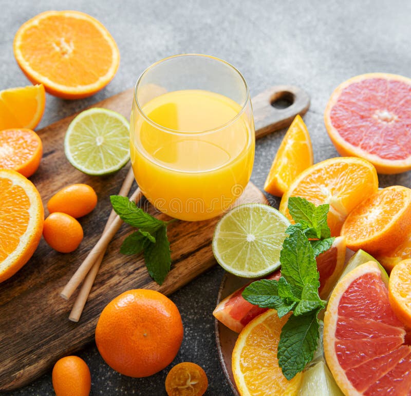 Glass of Juice and Citrus Fruits Stock Photo - Image of liquid, lime ...