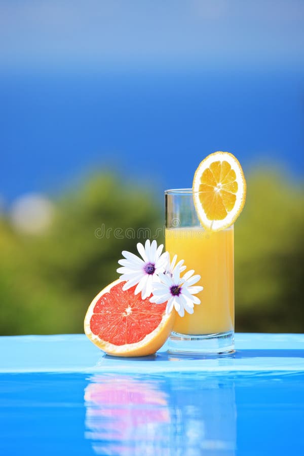 Orange Juice at the Poolside Stock Photo - Image of holiday, pool: 3031840
