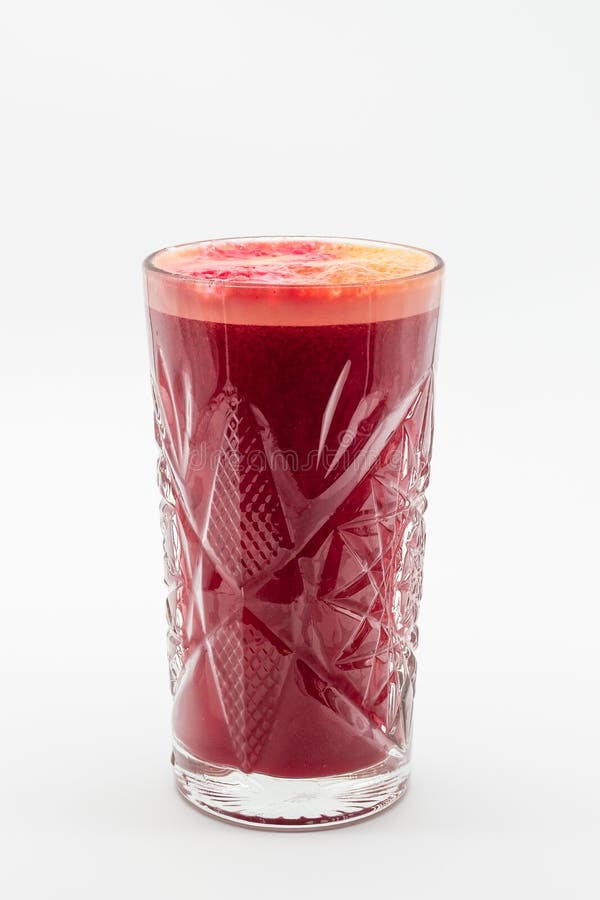 A Glass of Juice with a Red Swirl on Top Stock Photo - Image of ...
