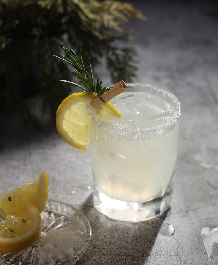 A Glass with Lemon Soda Cold Cocktail with Ice Stock Photo - Image of ...