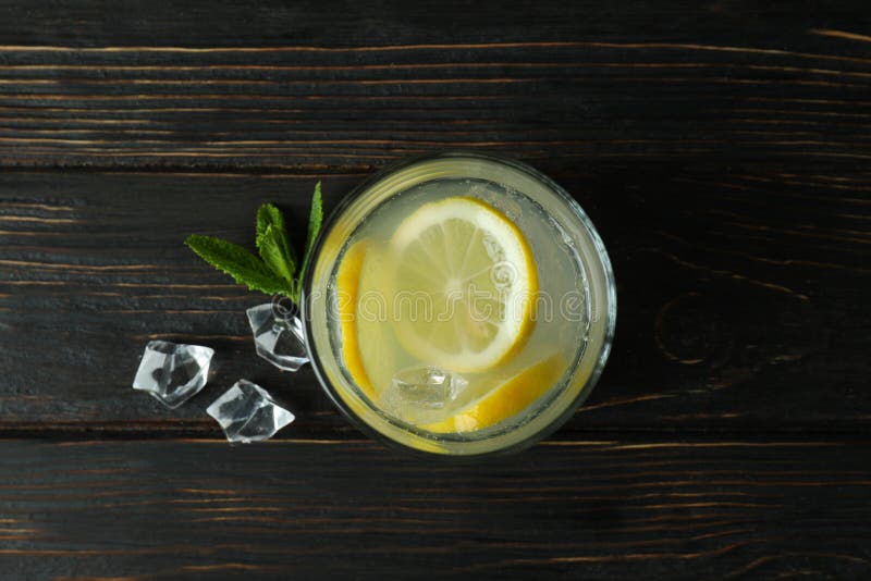 Glass of Lemonade on Wooden Table, Top View Stock Photo - Image of cube ...