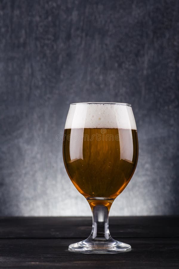 Glass of light beer stock image. Image of lager, foam - 80205465