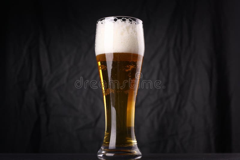 Light beer on a barrel stock photo. Image of froth, barrel - 92816148