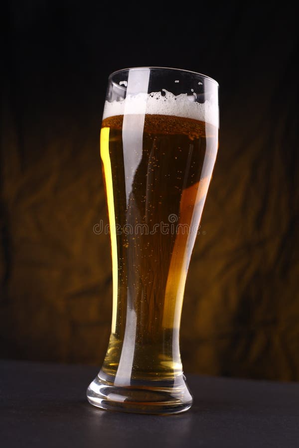 Light beer on a barrel stock photo. Image of froth, barrel - 92816148