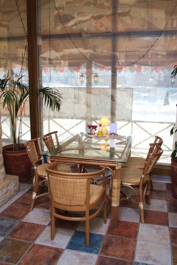 Glass little table in cafe stock photo. Image of palm - 2133424
