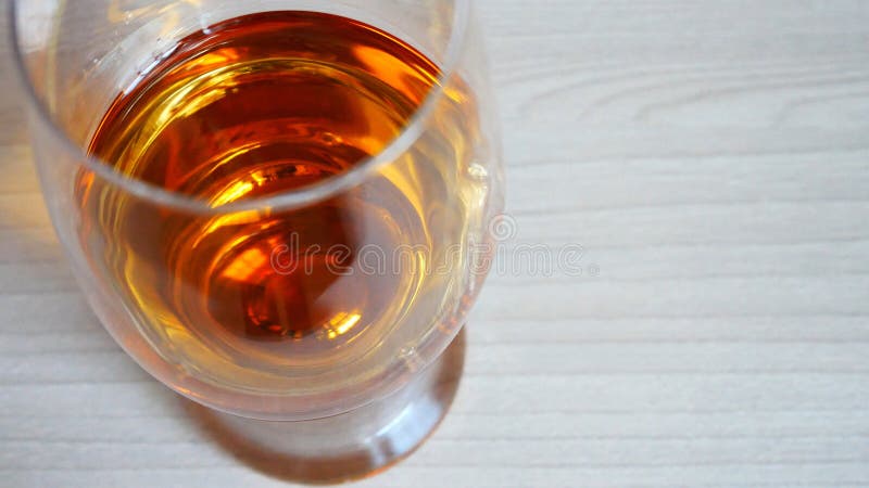 A Glass of Luxury Alcohol on the Table Close-up Stock Image - Image of ...