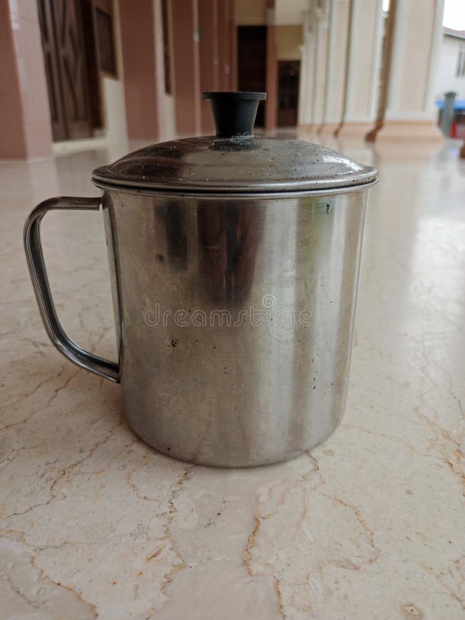 The Glass is Made of Zinc, Along with the Lid. Unique Stock Photo ...