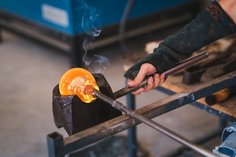 Glass making process. stock image. Image of blowing - 115477097