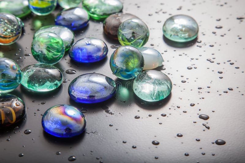 Glass Marble Balls and Glass Pebbles Stock Photo - Image of shiny ...