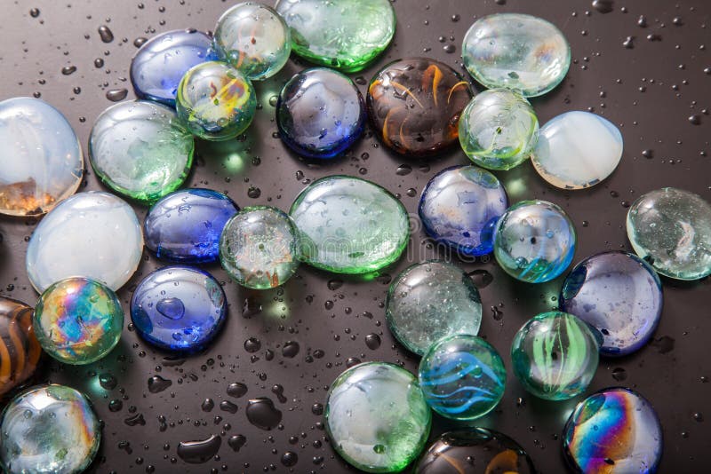 Glass Marble Balls and Glass Pebbles Stock Photo - Image of shiny ...